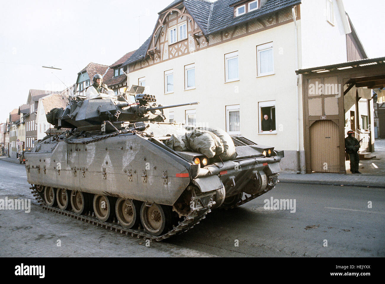 An M-2 Bradley fighting vehicle from the 7th Infantry moves along a ...