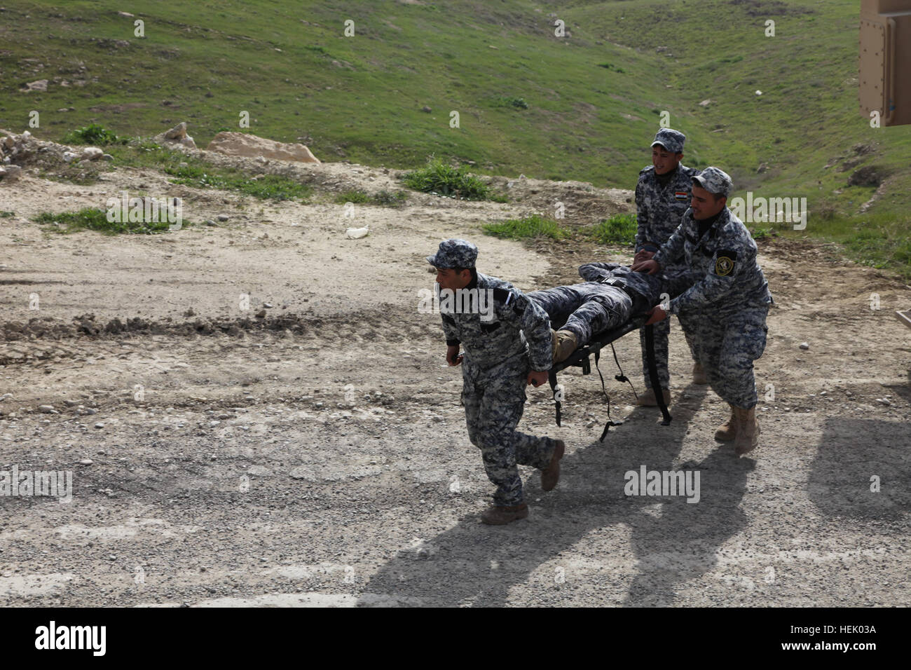 The Iraqi Federal Police are practicing their first aid training during ...