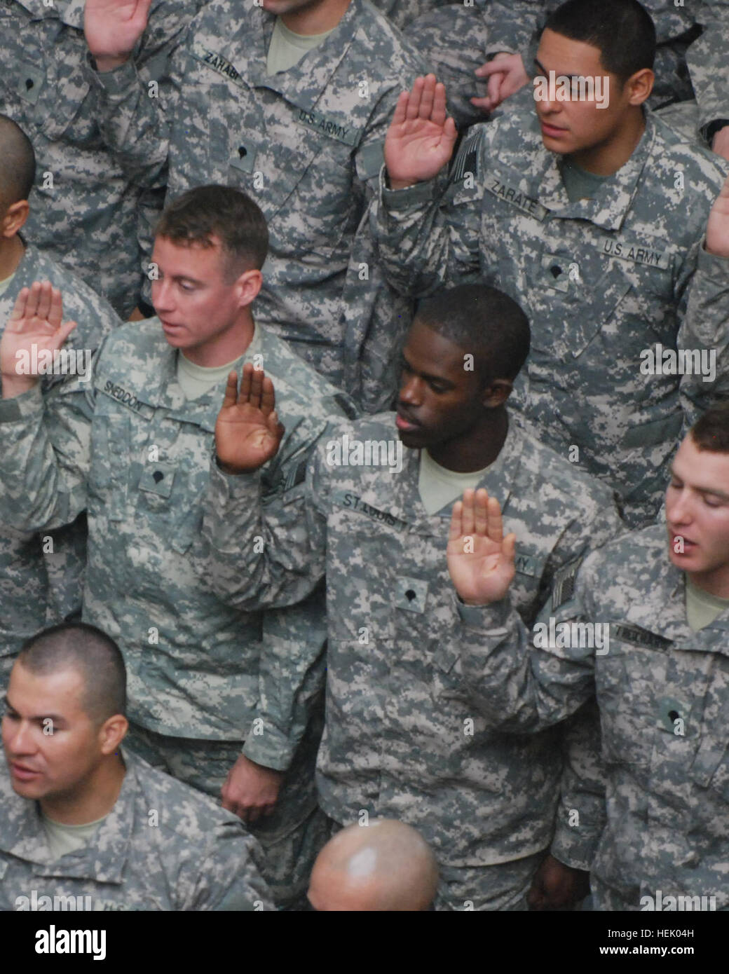 Spc. Ronald St. Louis (second from the right), a member serving with ...