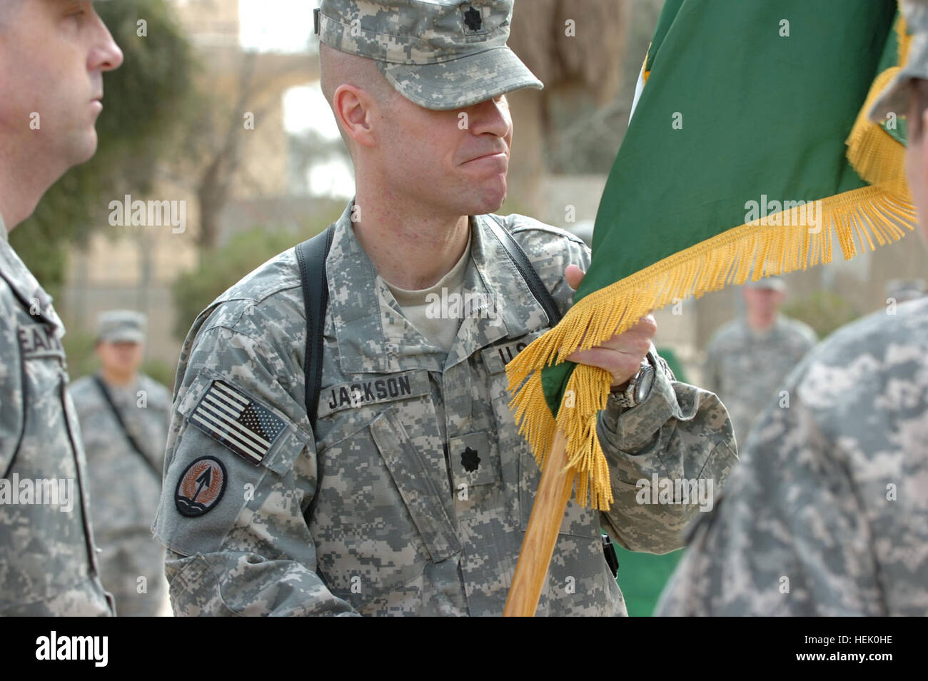 Lt. Col. Mark Jackson passes the battalion colors to Brig. Gen. Colleen ...