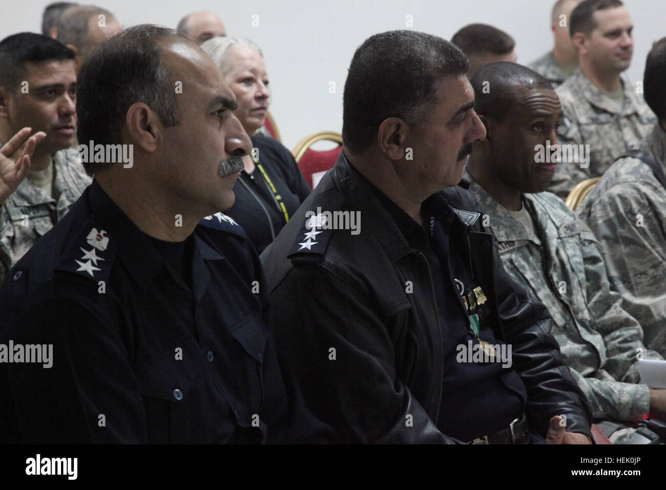 Members of the Iraqi police receive a brief on election day security at ...