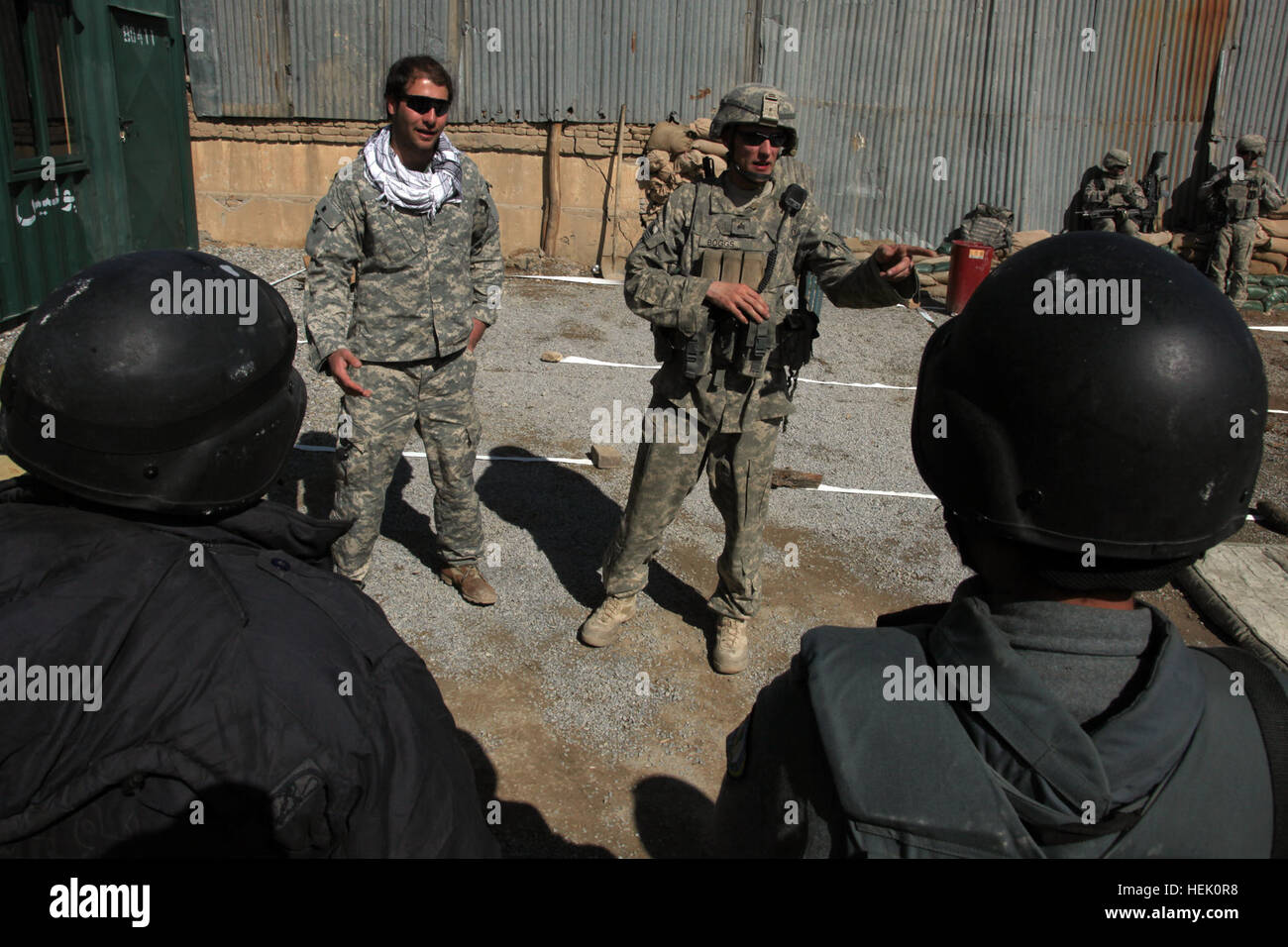 A U.S. Army soldier from the 118th Military Police company instructs a ...