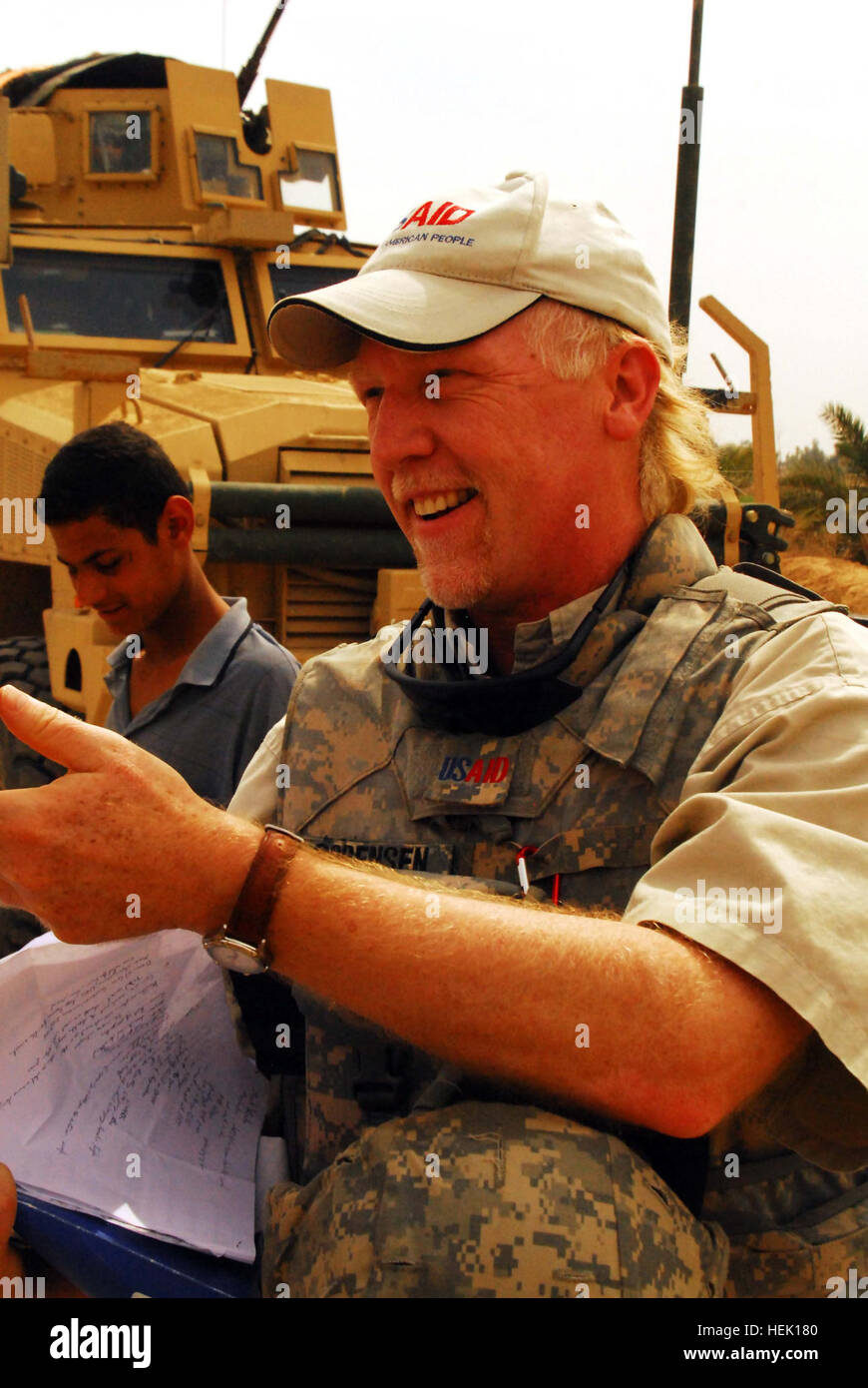 Mark Sorenson, a U.S. AID worker has a conversation security guards ...