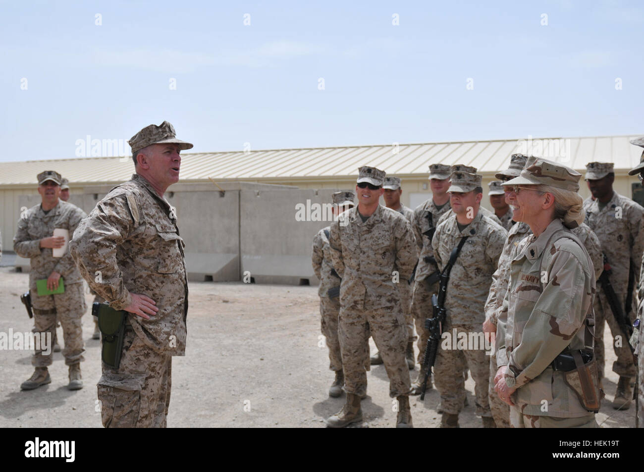 Surgeon General of the U.S. Navy Vice Adm. Matthew Nathan talks with a ...