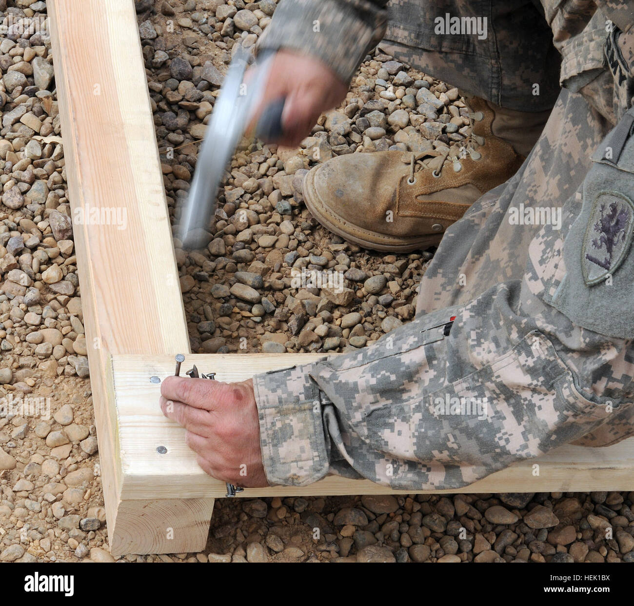Spc. Steve Rich, a carpenter assigned to 1434th Engineer Company, 101st ...