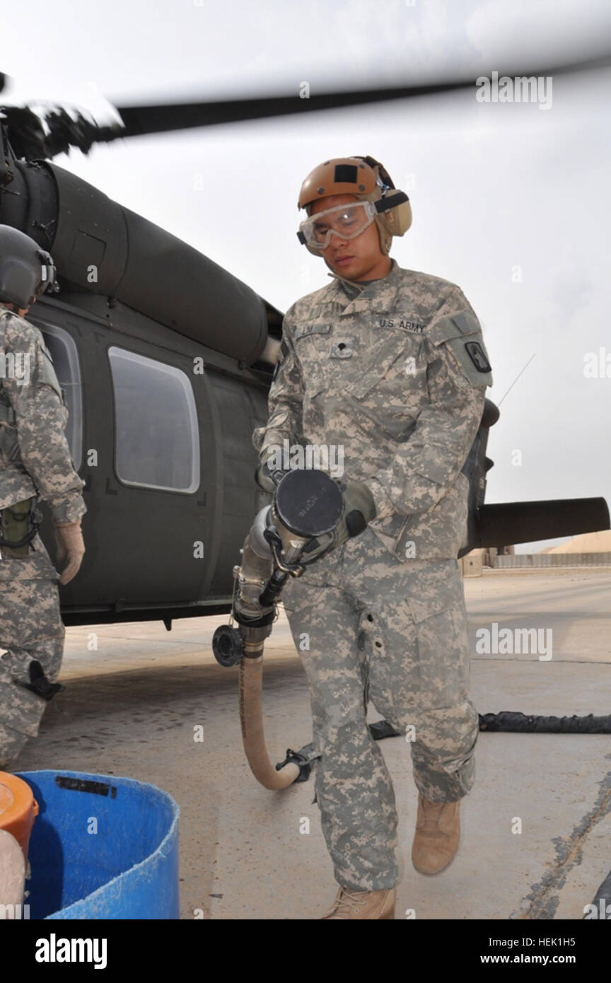 Army Spc. John Lim, Manila, Philippines, a Task Force 38 fueler with E ...