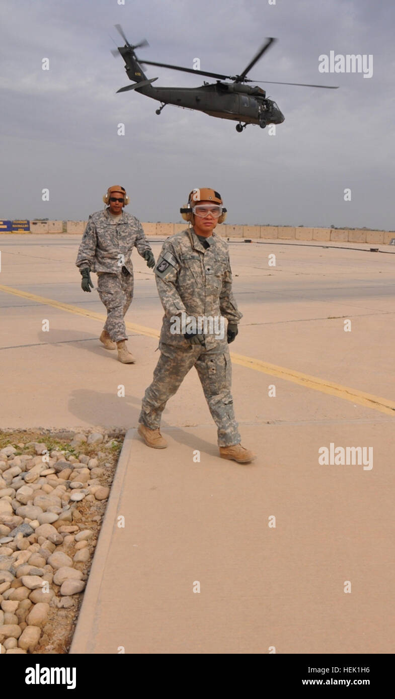 Army Sgt. Charles Smith, left, and Spc. John Lim, refuelers with Task ...