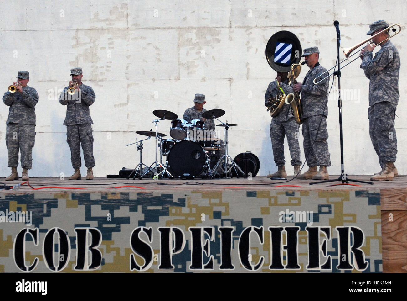 The Night Shift Brass Band from the 3rd Infantry Division Band helps ...