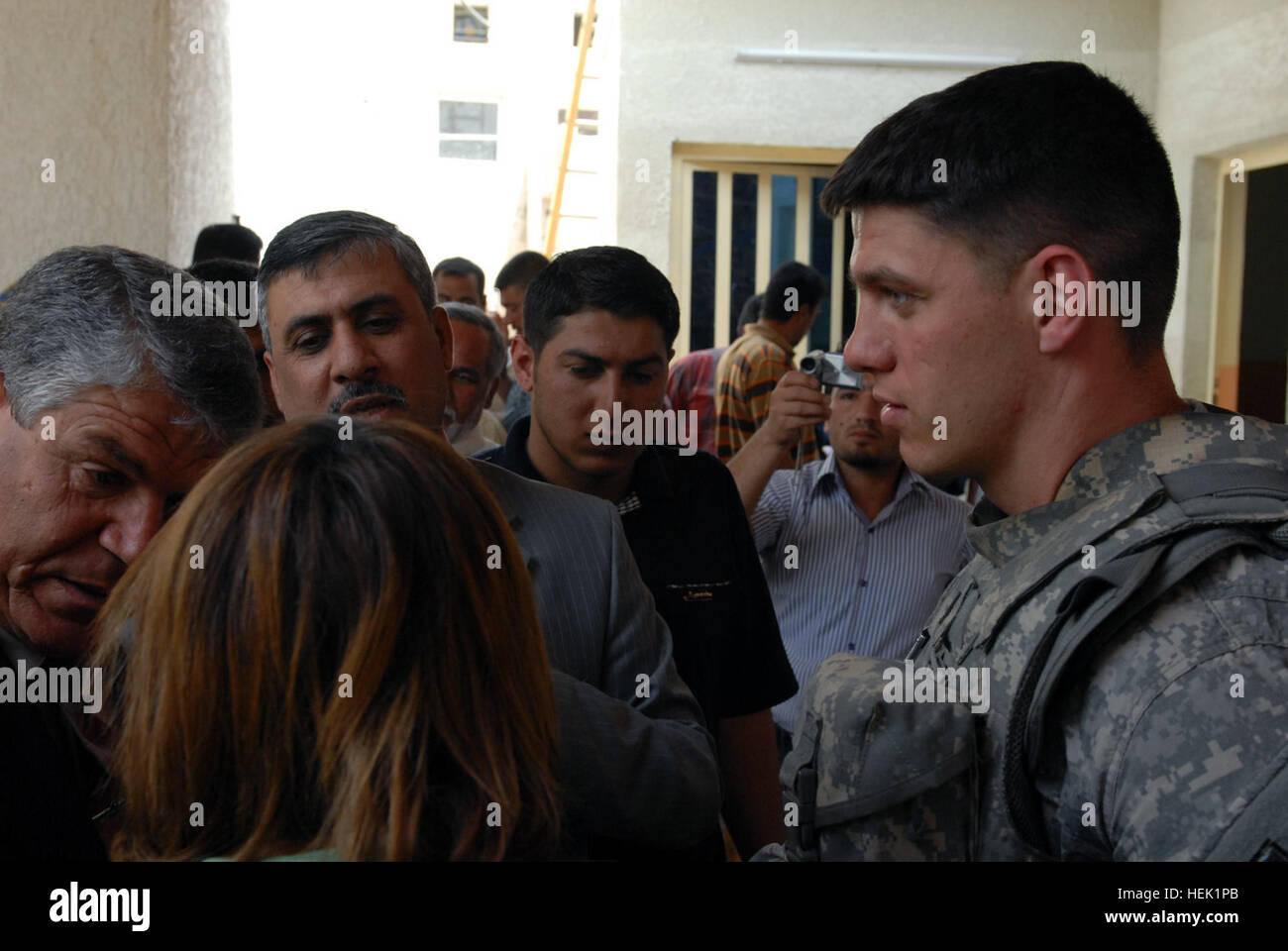 First Lt. Justin Casey (right), from Ogdensburg, N.Y., assigned to ...