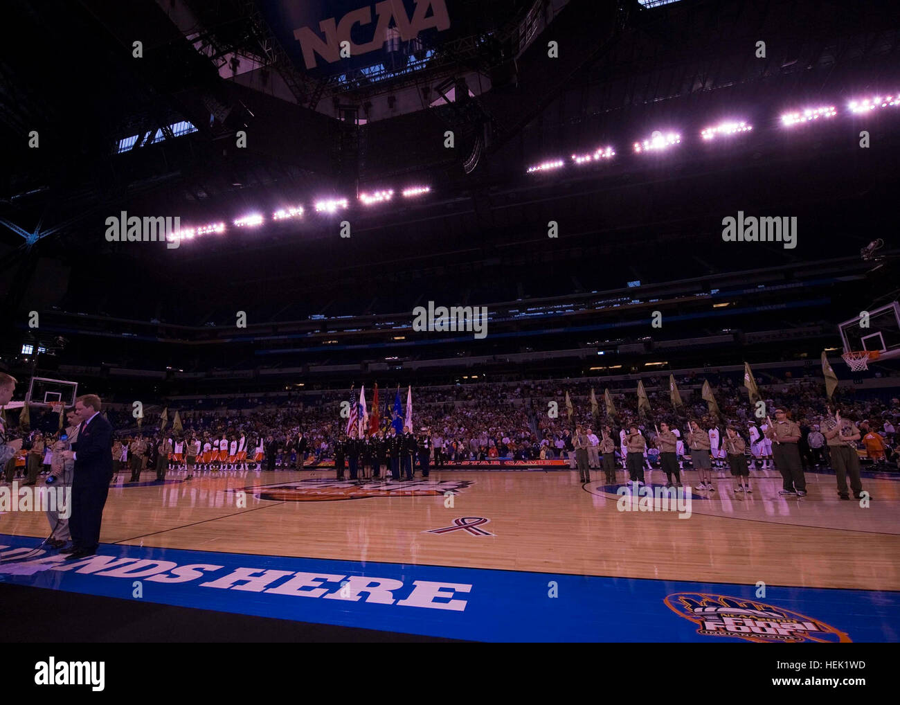 Members of the Indiana National Guard sing the National Anthem during ...