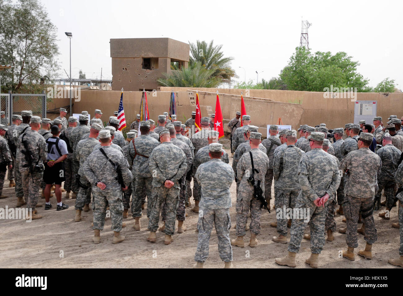 Soldiers listen to Command Sgt. Maj. Timothy Campbell during a memorial ...