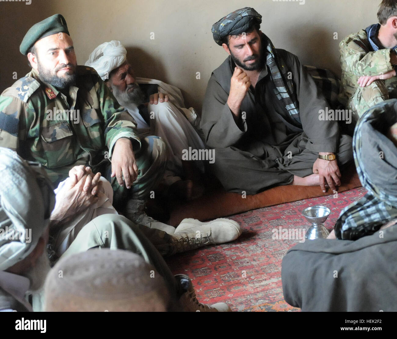 An Afghan National Army Religious Officer with the 4th Kandak urges ...