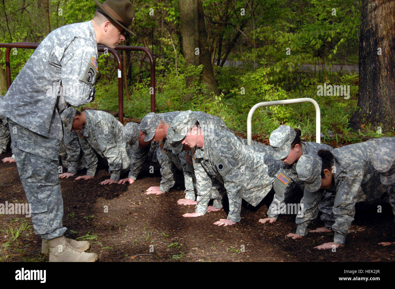 Several Company I Soldiers do pushups as they get "smoked" by a drill ...