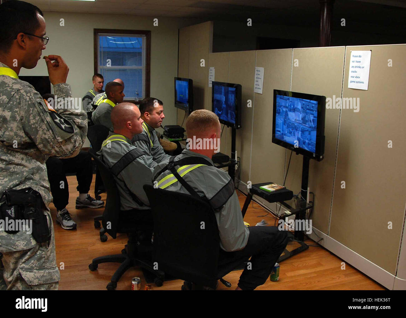 Soldiers play video games at the newly remodeled USO at Camp Atterbury ...
