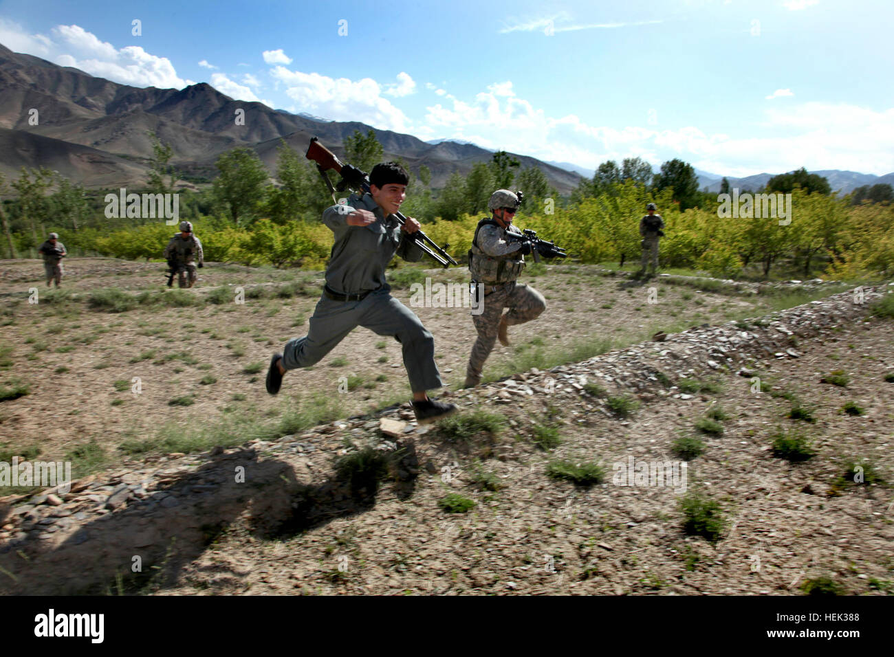 An Afghan national police officer and a U.S. Army soldier from 1st ...