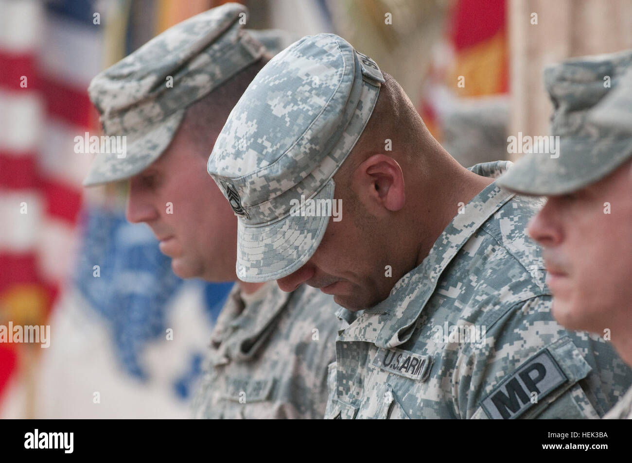 Master Sgt. Jose Shorey, from San Antonio, Texas, bows his head as he ...