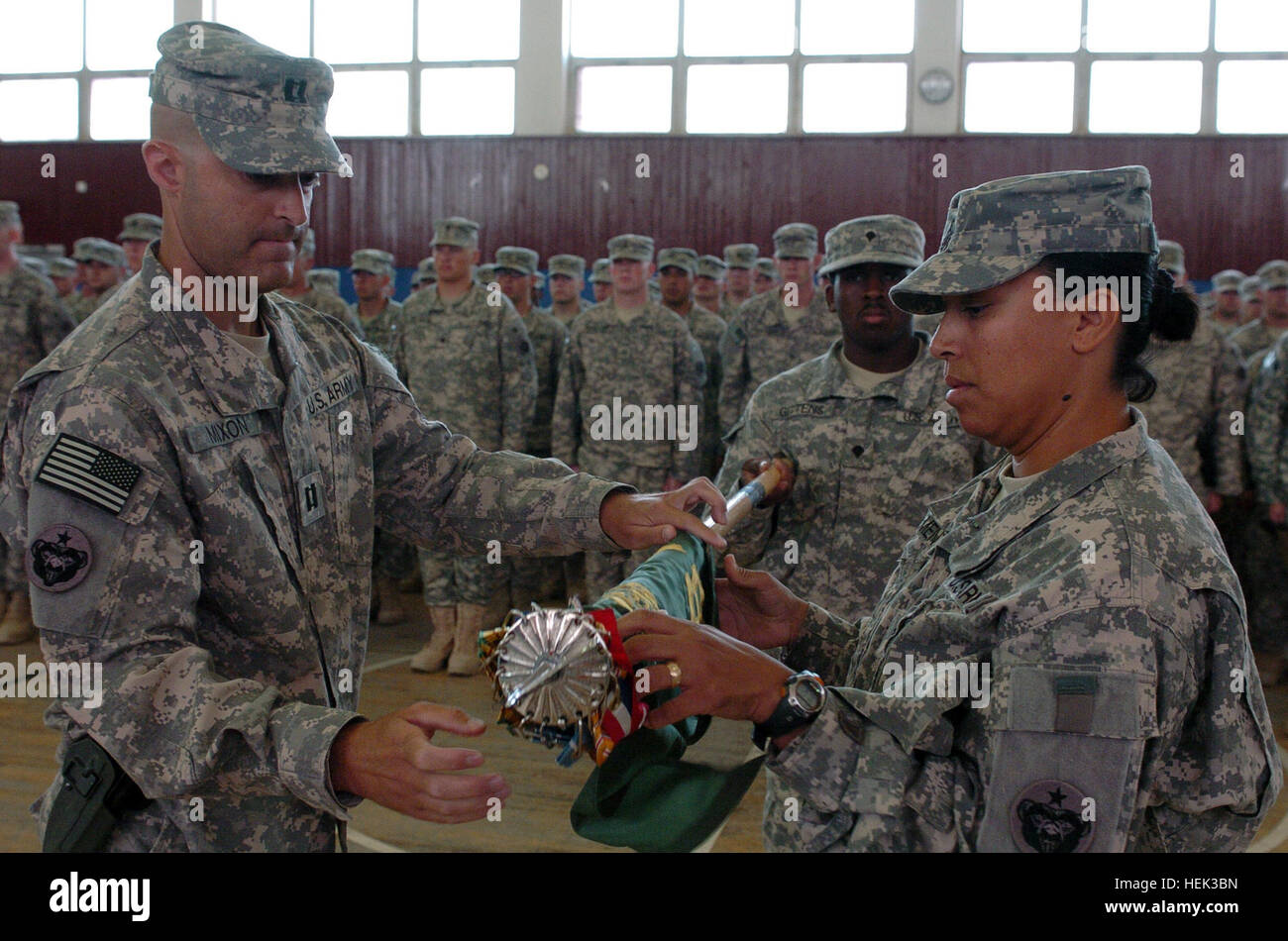 Leaders of the 545th Military Police Company case the unit guidon ...