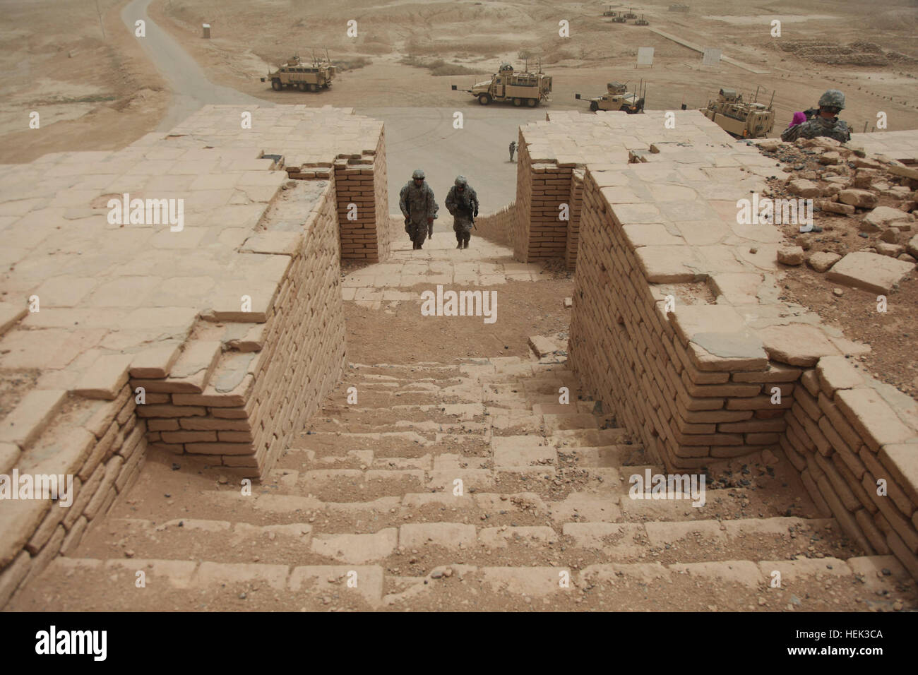 U.S. Soldiers from 17th Fires Brigade walk the stair case of one of the ...
