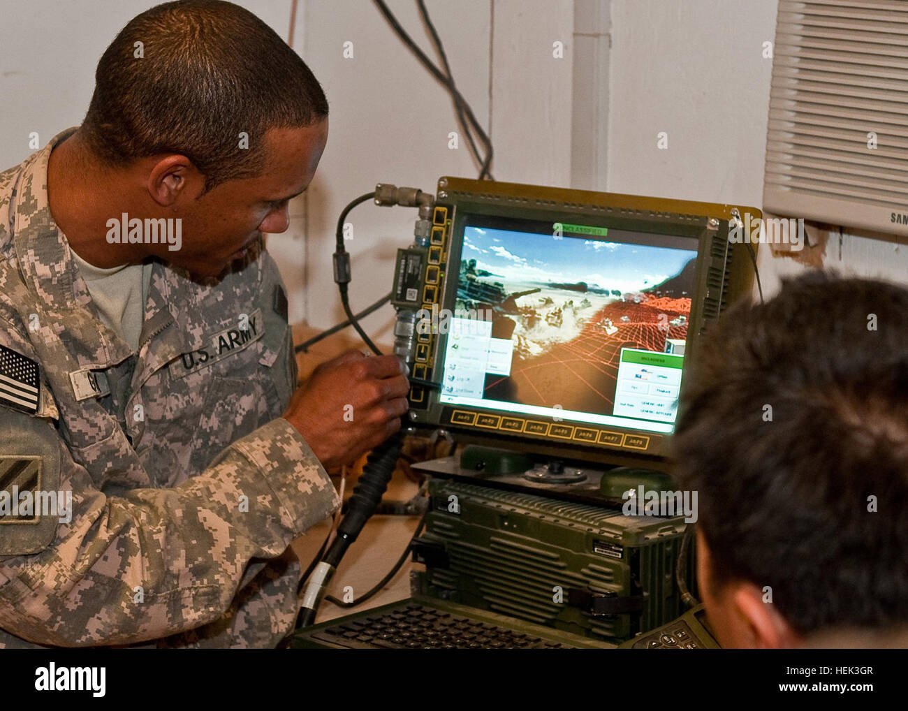 Spc. Johnny Guillory, Greeneville, Miss., a computer detection systems ...