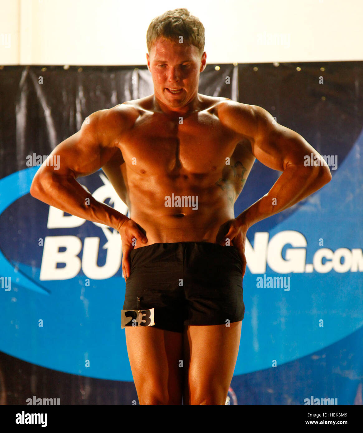A U.S. Navy Petty Officer competes in a bodybuilding event at ...