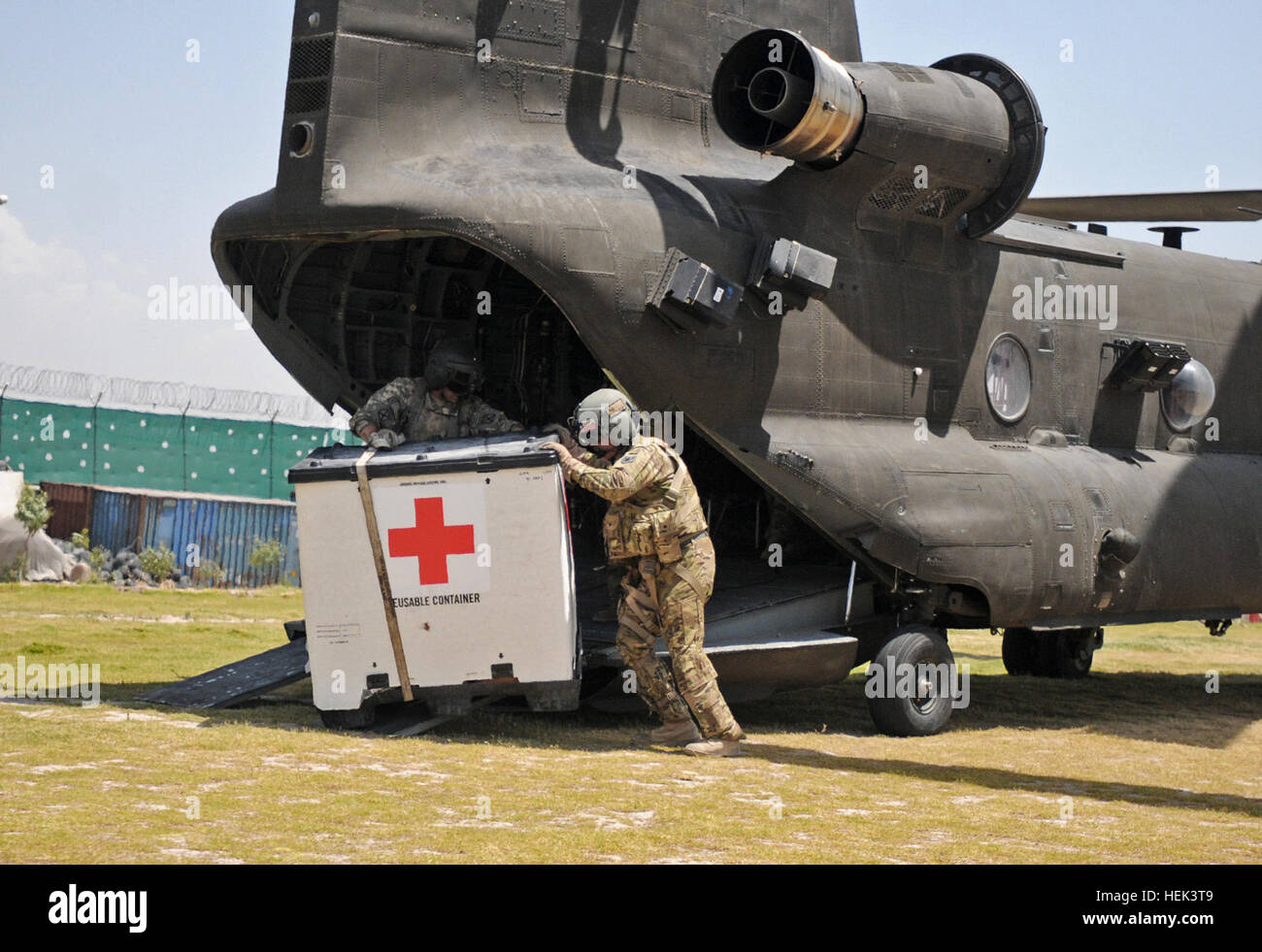 An RC-East CH-47 Chinook crew delivers expendable first aid supplies to ...
