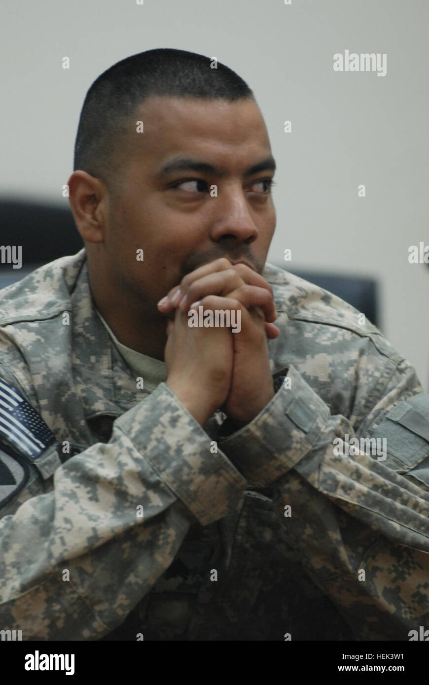 Sgt. Juan Reyes, medic stationed out of Fort Hood, Texas, watches ...