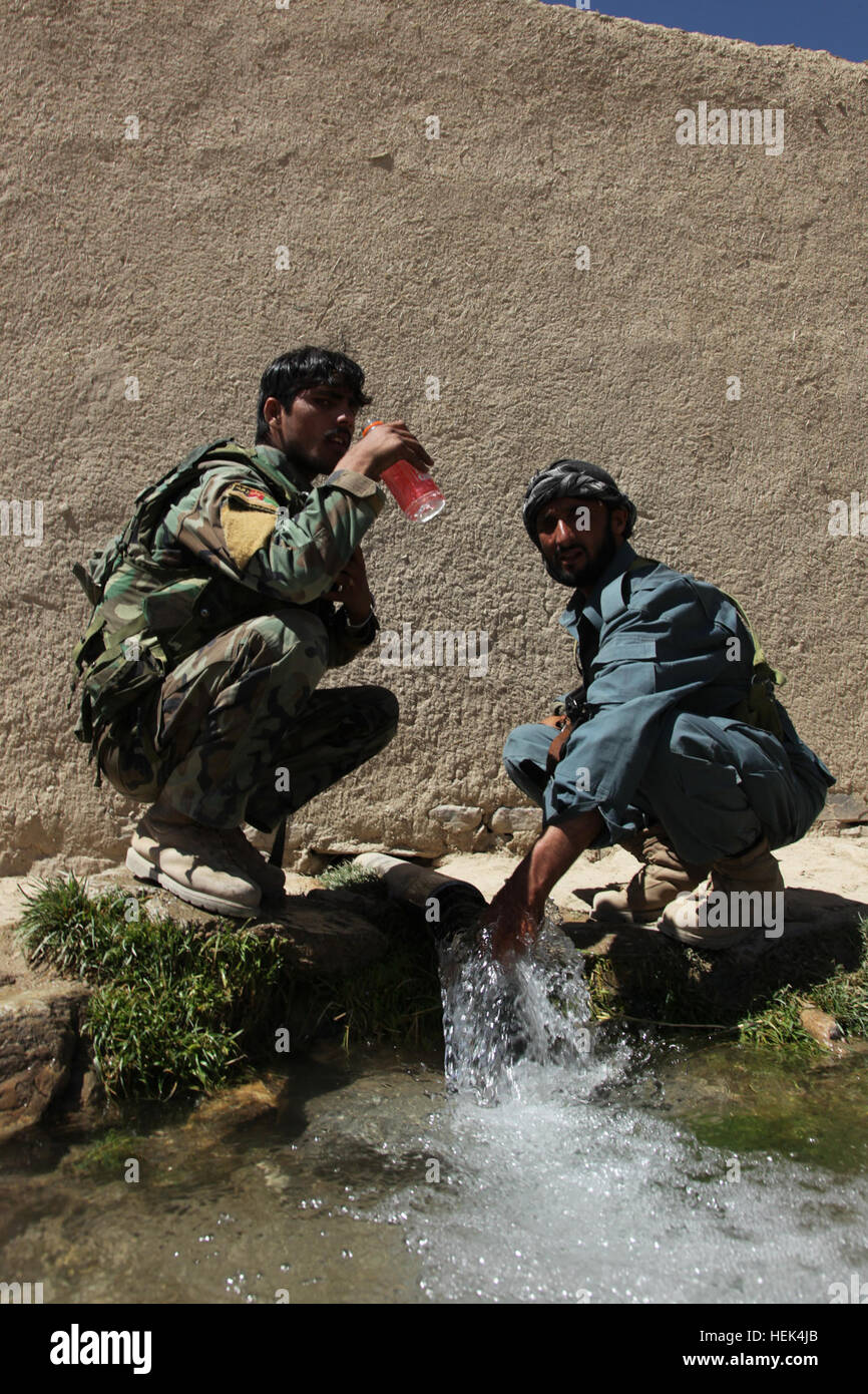 An Afghan National Army soldier and an Afghan National Police officer ...