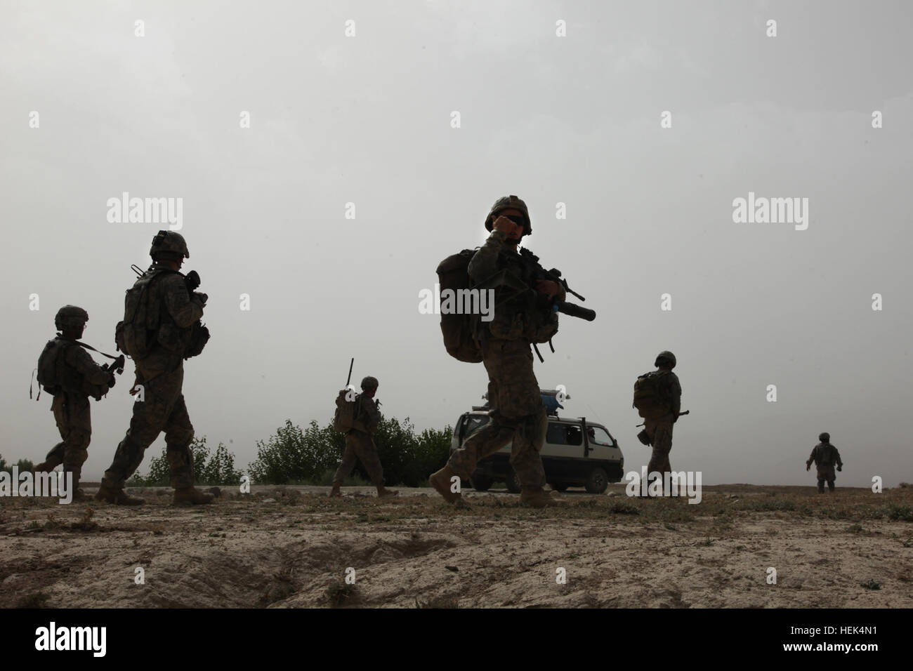U.S. Army soldiers patrol through the deserts of Jaghato District ...