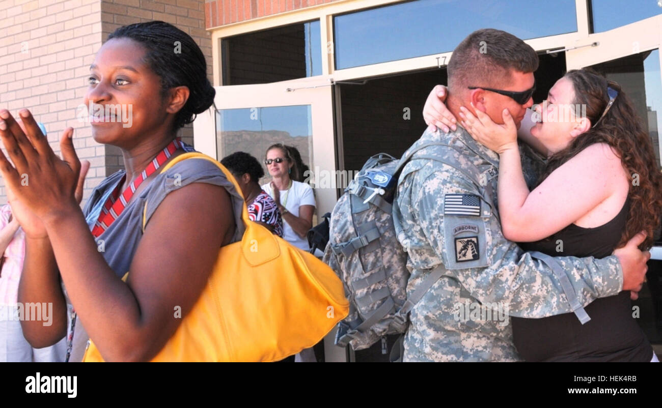 Sarah Boykin, of Meryville, La., greets her husband, Spc. Tommy Boykin ...
