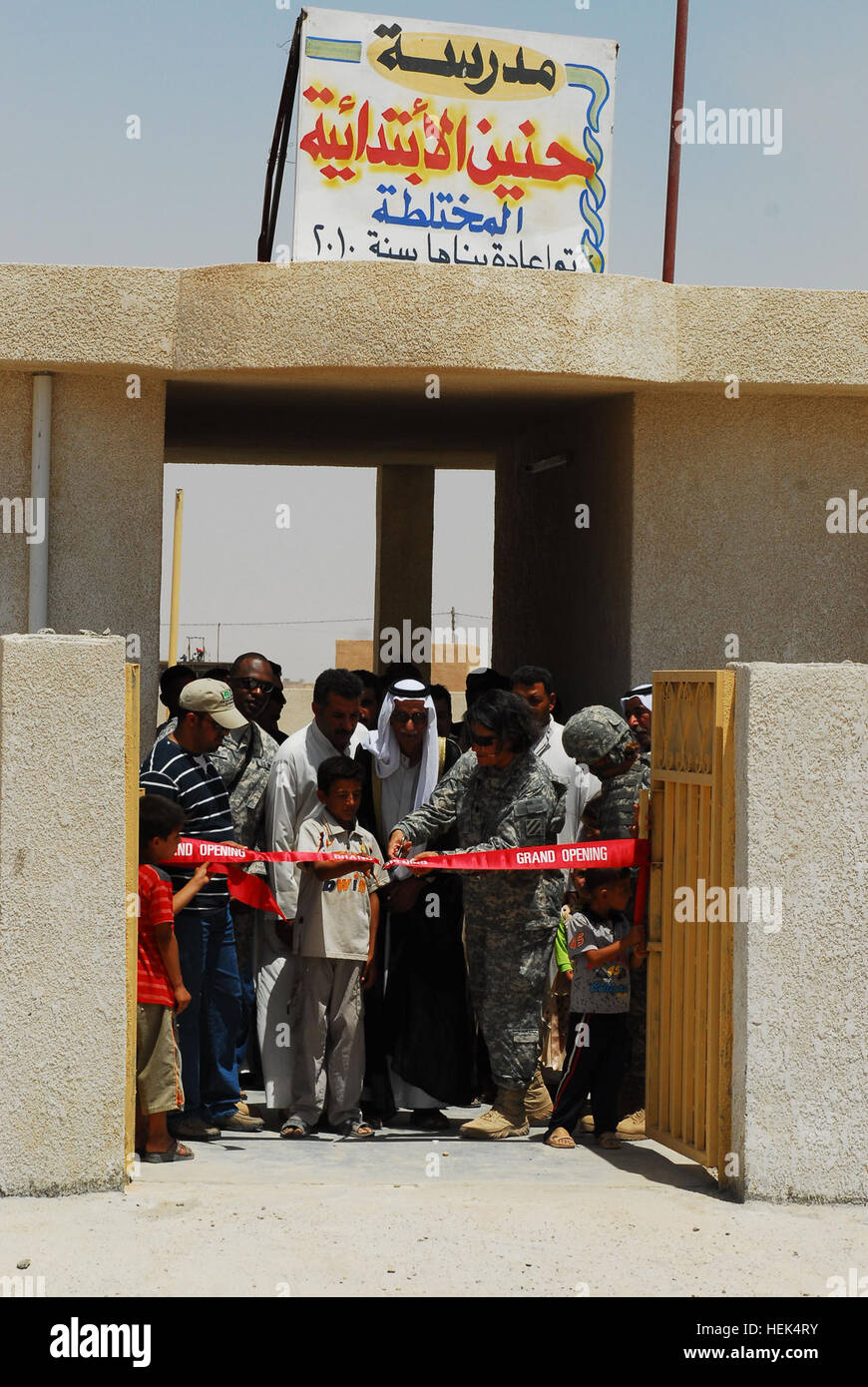 Local villagers and children gather for the grand opening of Al Haneen ...