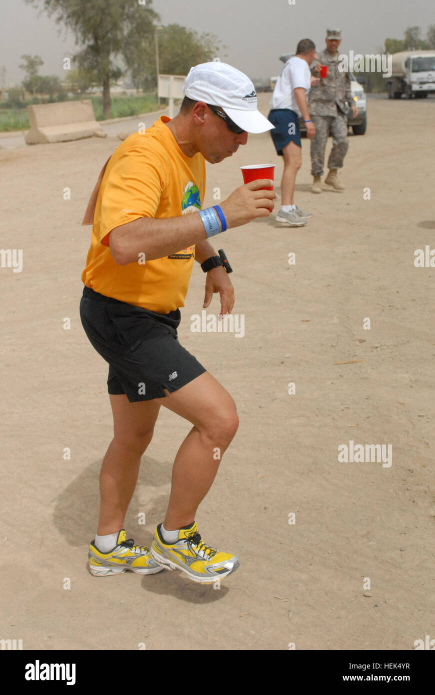 Lt. Col. Mark takes a sip of water provided by a member of his Nevada ...