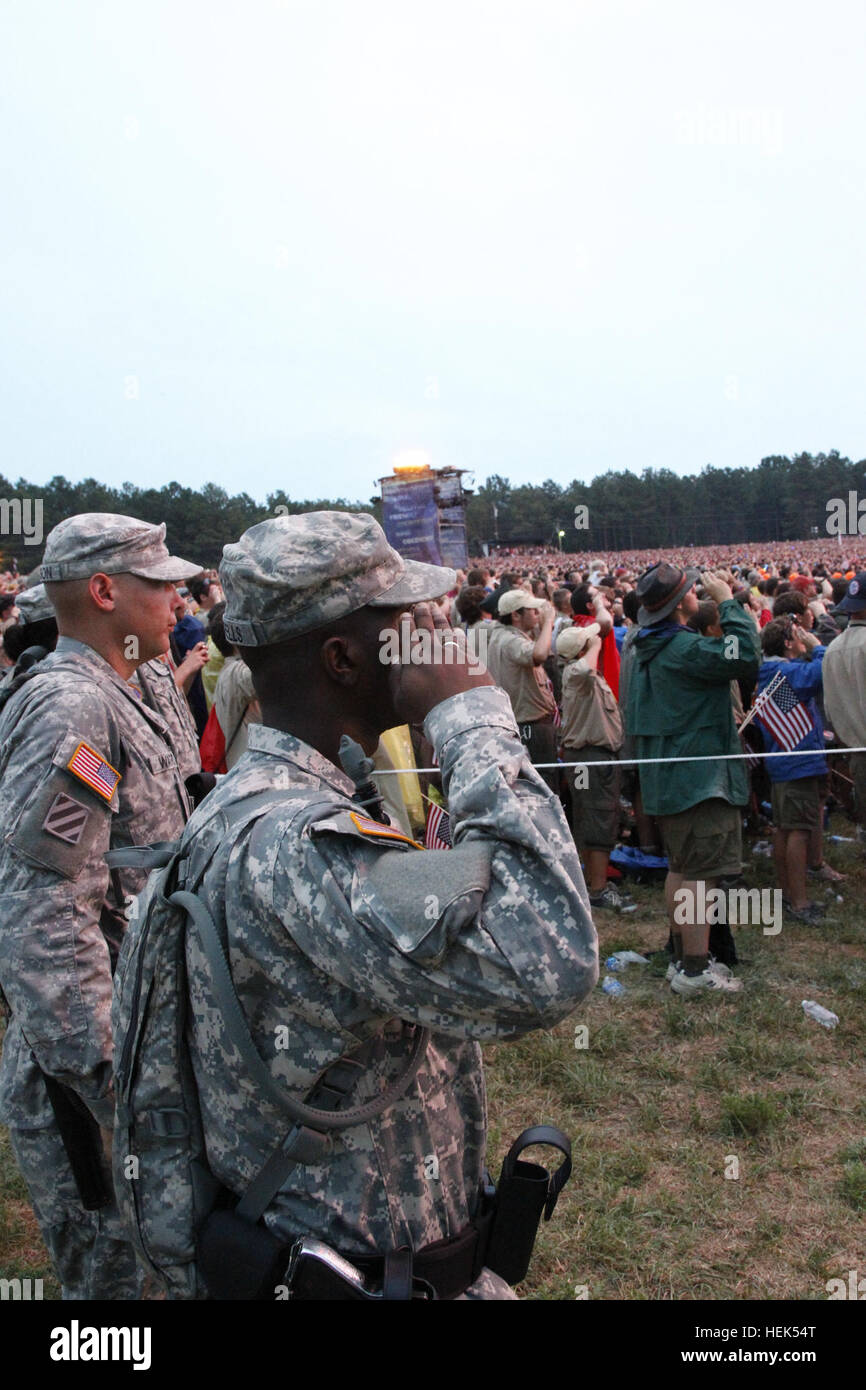 A soldier from Joint Task Force National Scout Jamboree renders honors ...