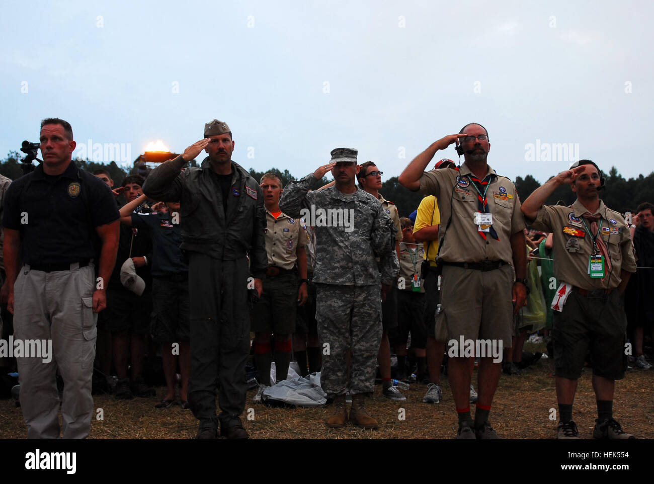 Members of the Air Force and the Army stand next to scout leaders ...