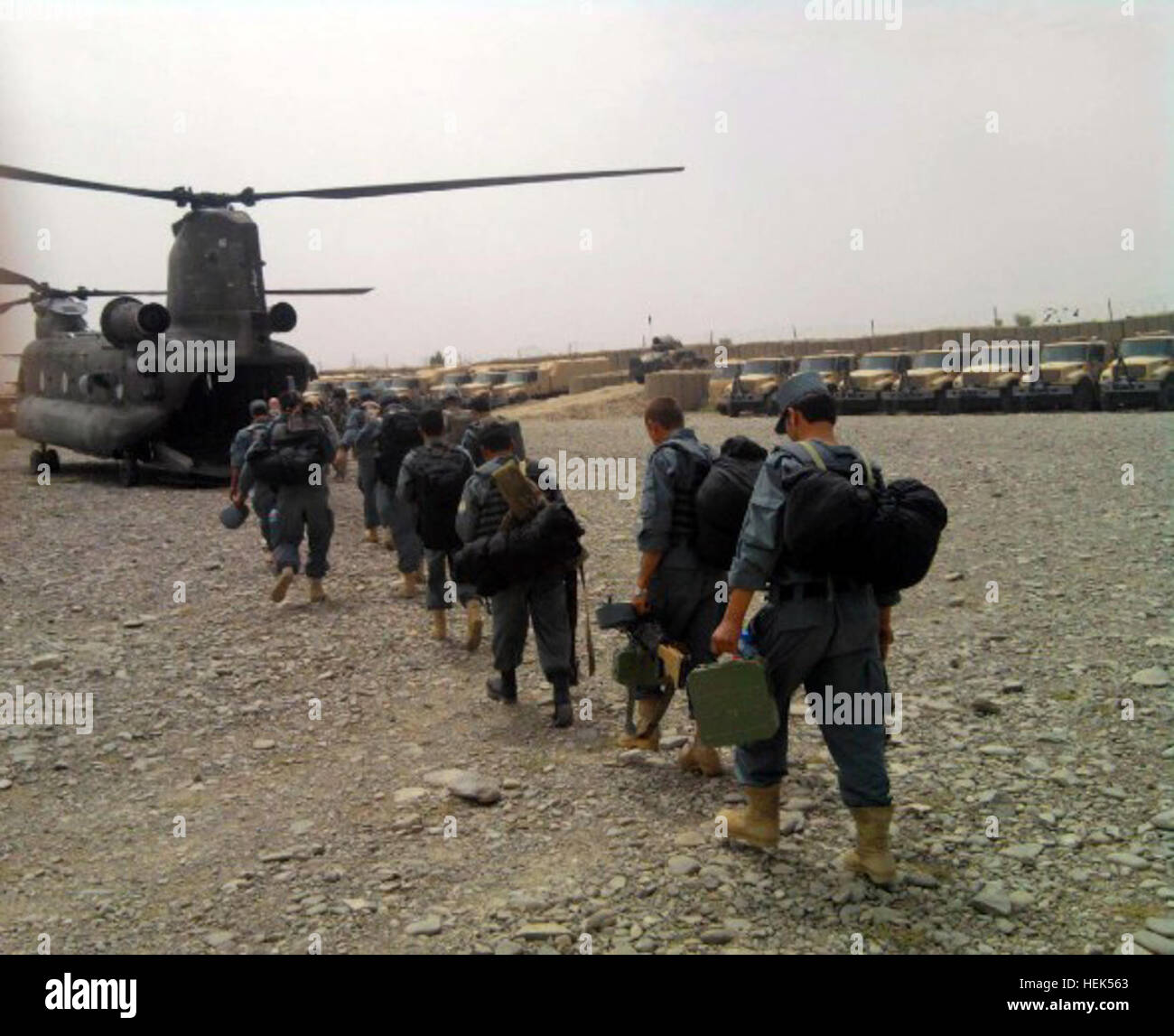 Afghan Uniform Police officers board CH-47 Chinook helicopters in ...