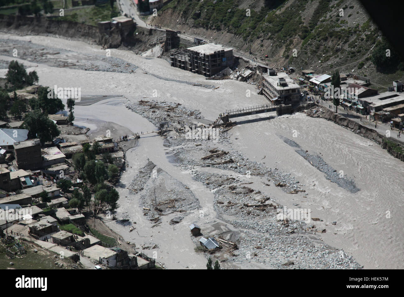 A washed-out bridge, damaged from flooding, is shown in Pakistan Aug. 5 ...