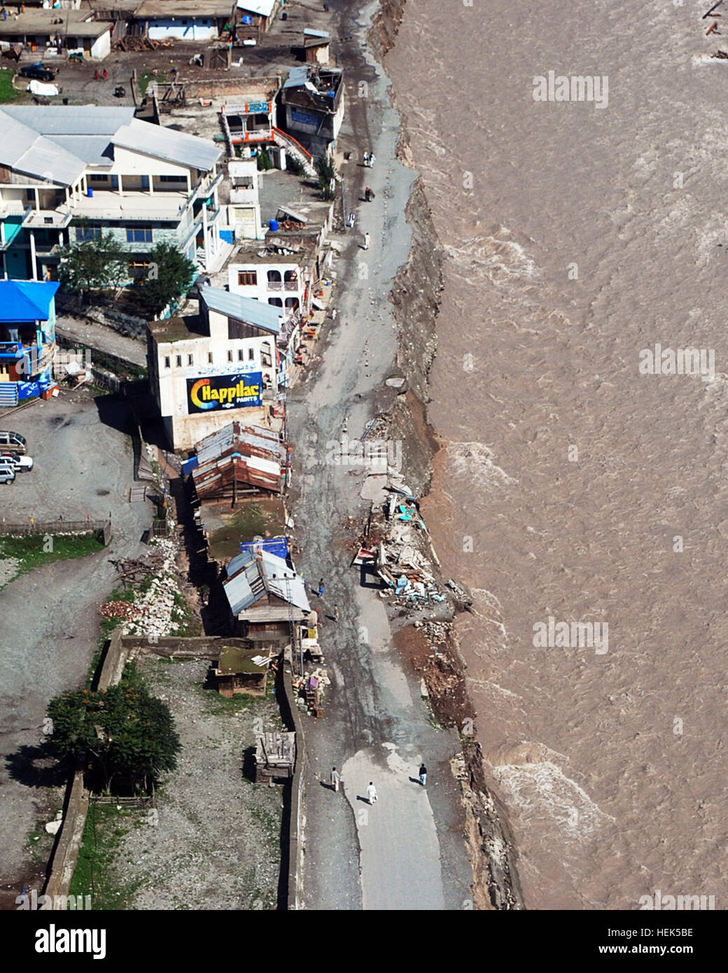 Shown here Aug. 11, 2010, flood waters have washed away all ground ...