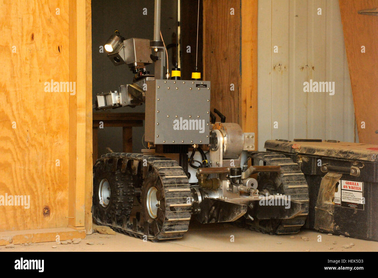 Iraqi Remote Ordnance Neutralization System robot enters a building in ...