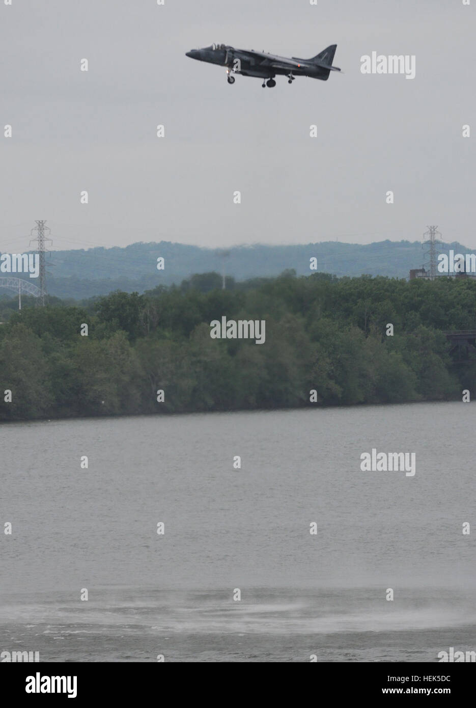 A Marine AV-8B Harrier jet performs its signature ability to hoover in ...