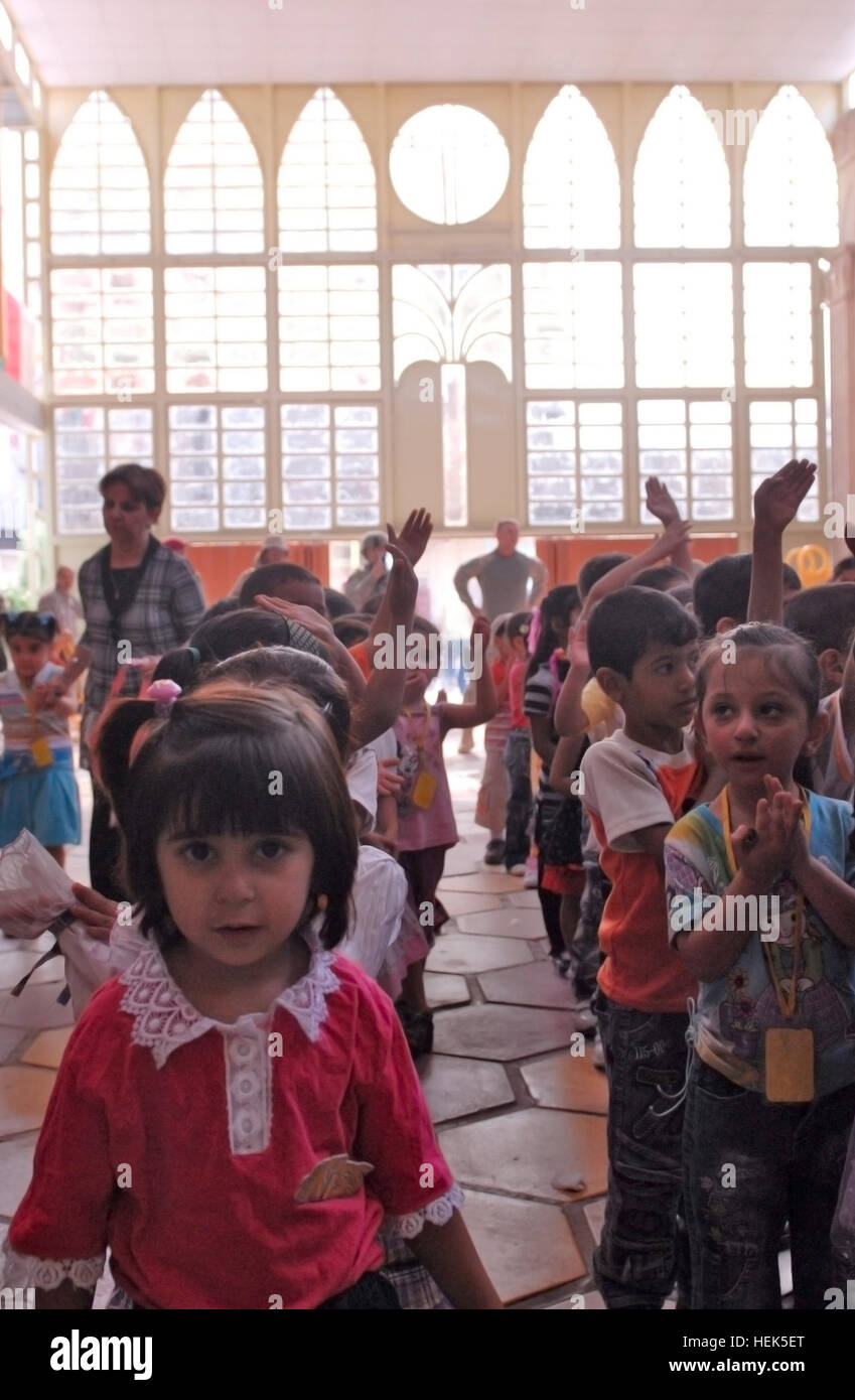 Students at St. Efram Elementary in Basra, Iraq, perform songs and ...