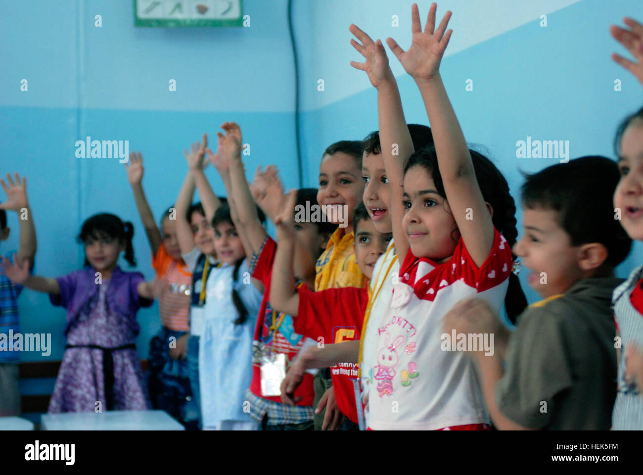 Students at St. Efram Elementary in Basra, Iraq on October 22 receive ...