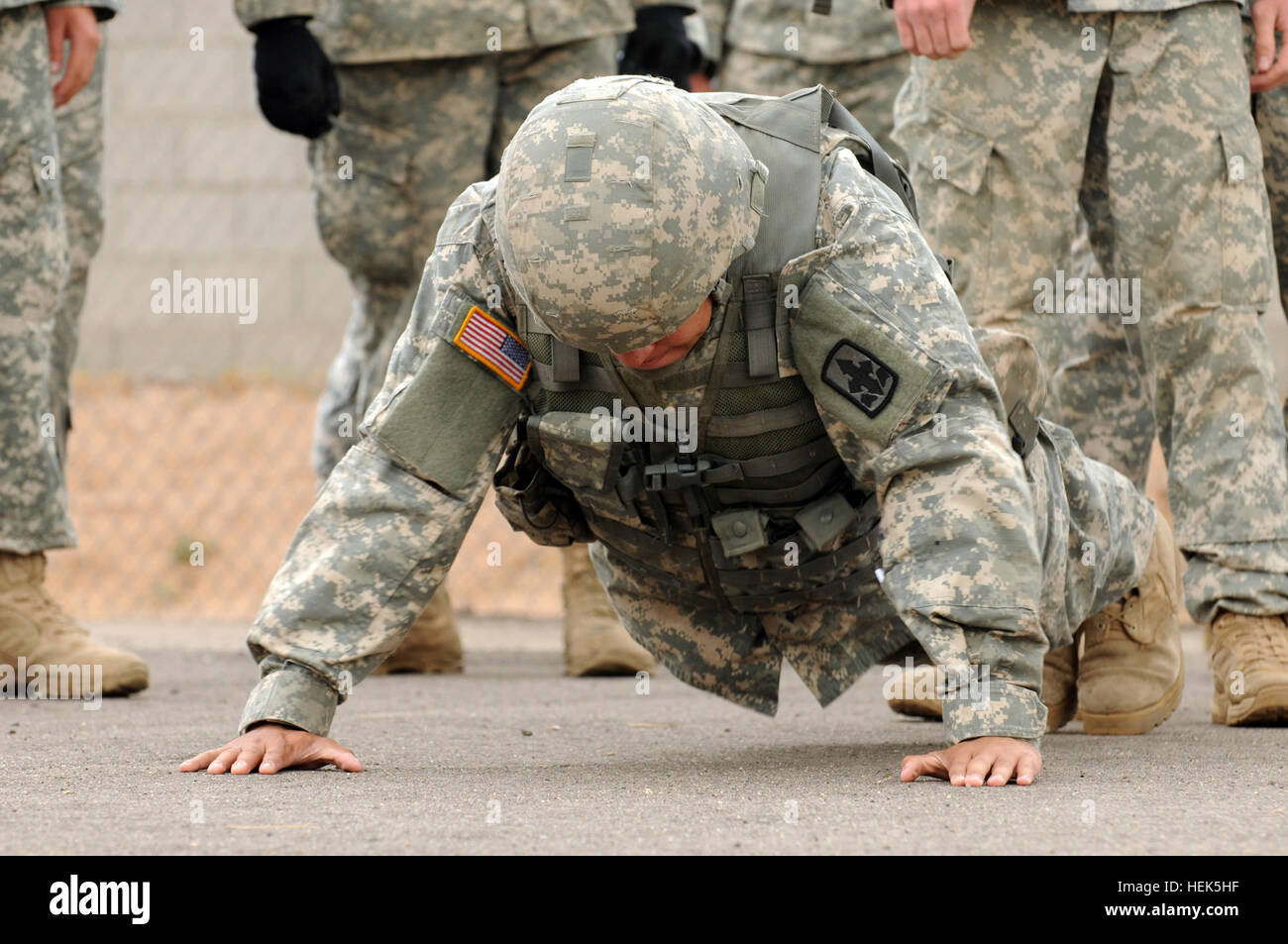 An Arizona National Guard Soldier performs push-ups during training for ...