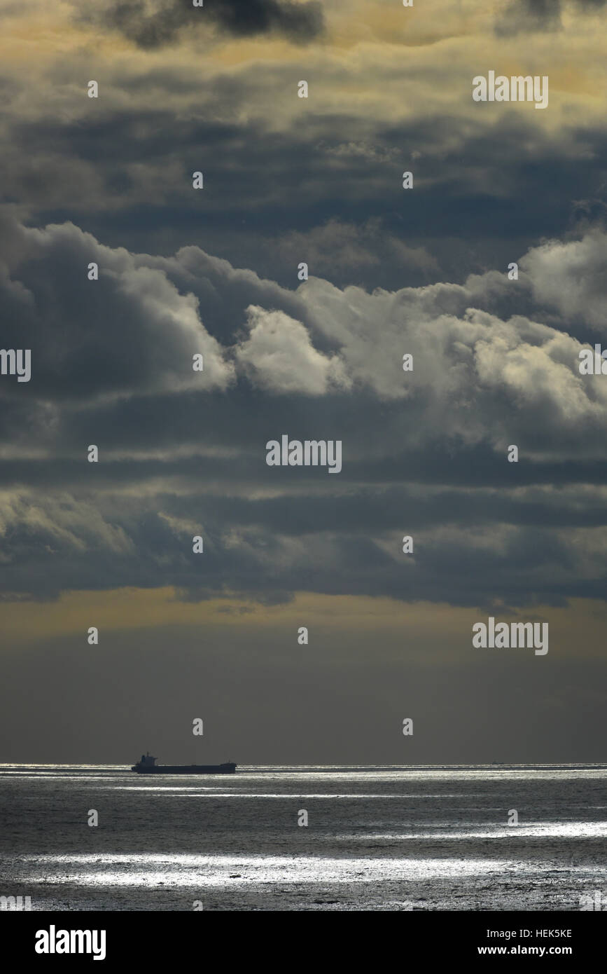Ship in the distance sailing through the English Channel under a ...