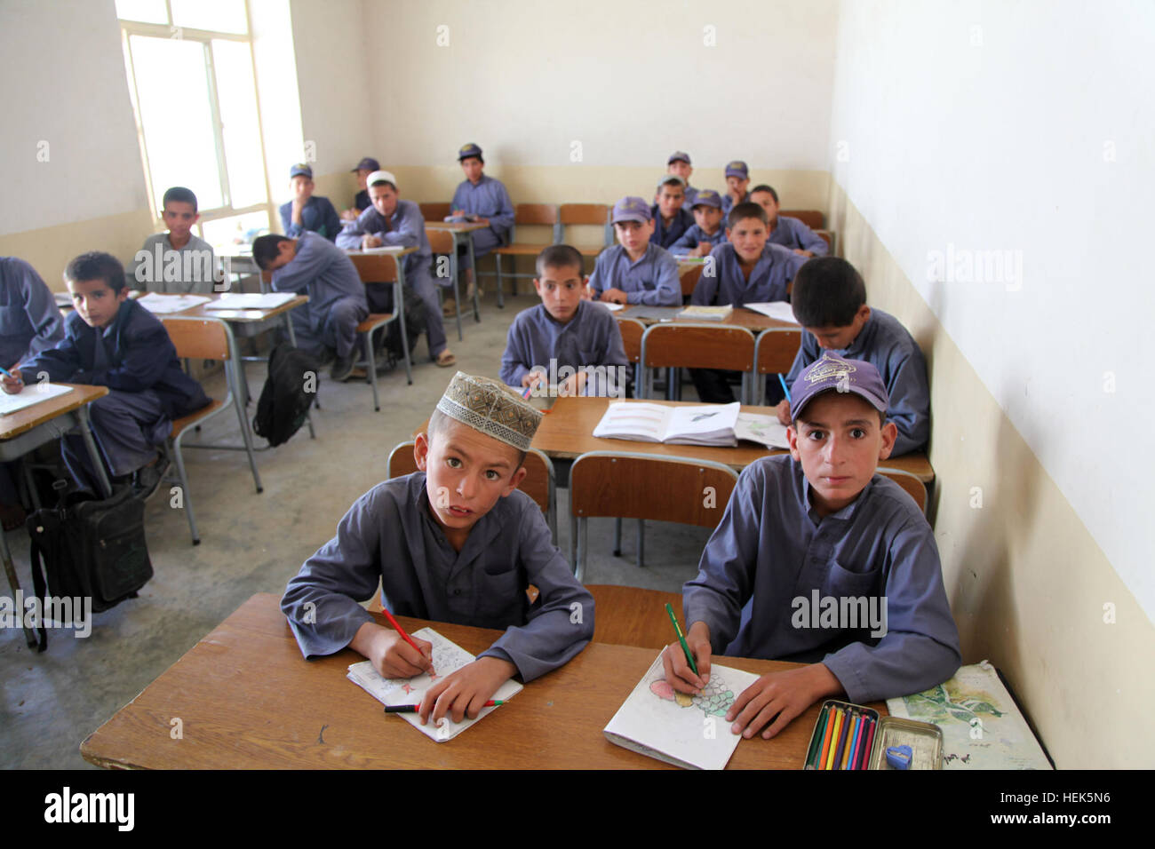 Afghan orphans complete school assignments Sept. 2, 2010, Pul e Alam ...
