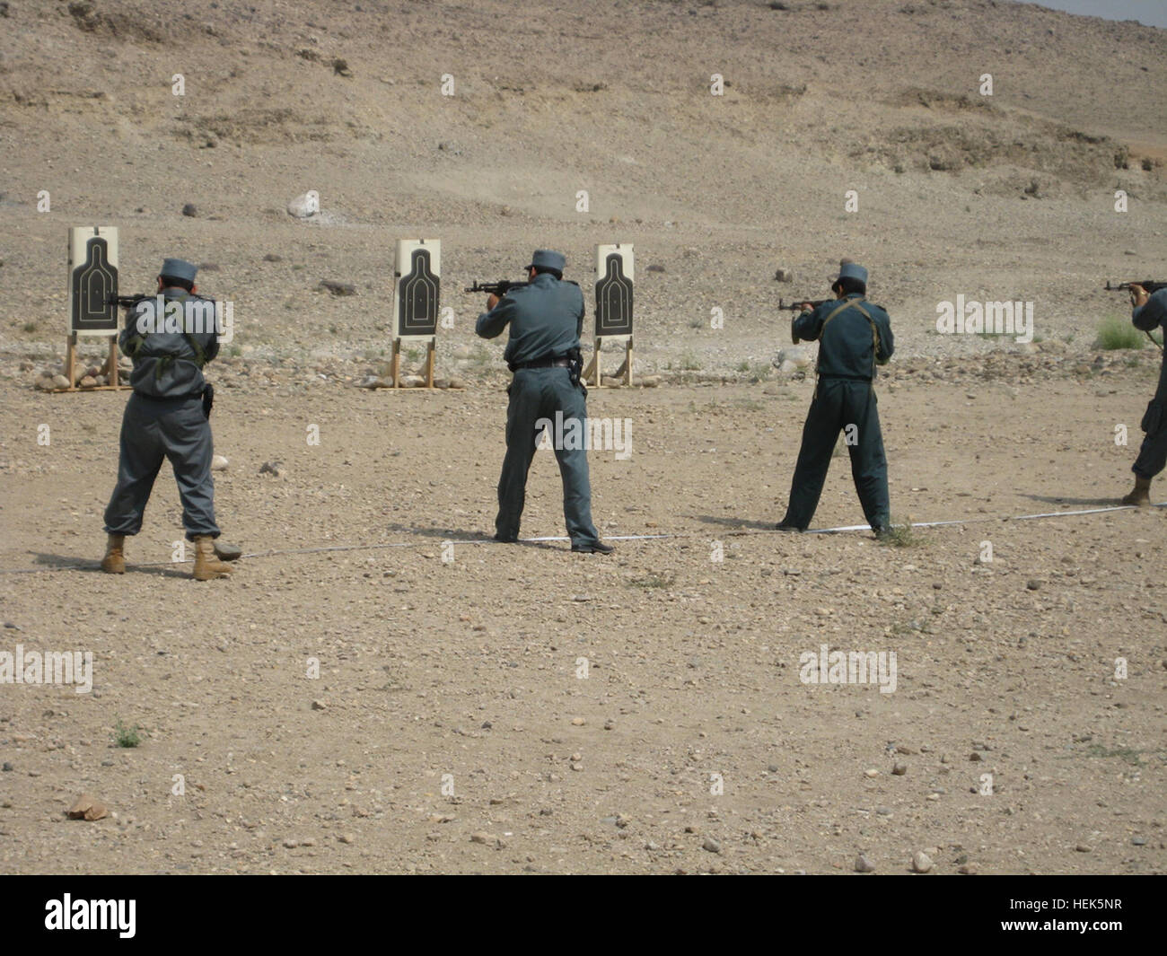 Afghan National Police practice firing their AK47 rifles from the ...