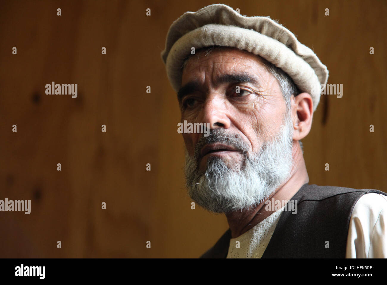 Sayed Abad District Governor Dr. Muslim listens to colleagues speak ...