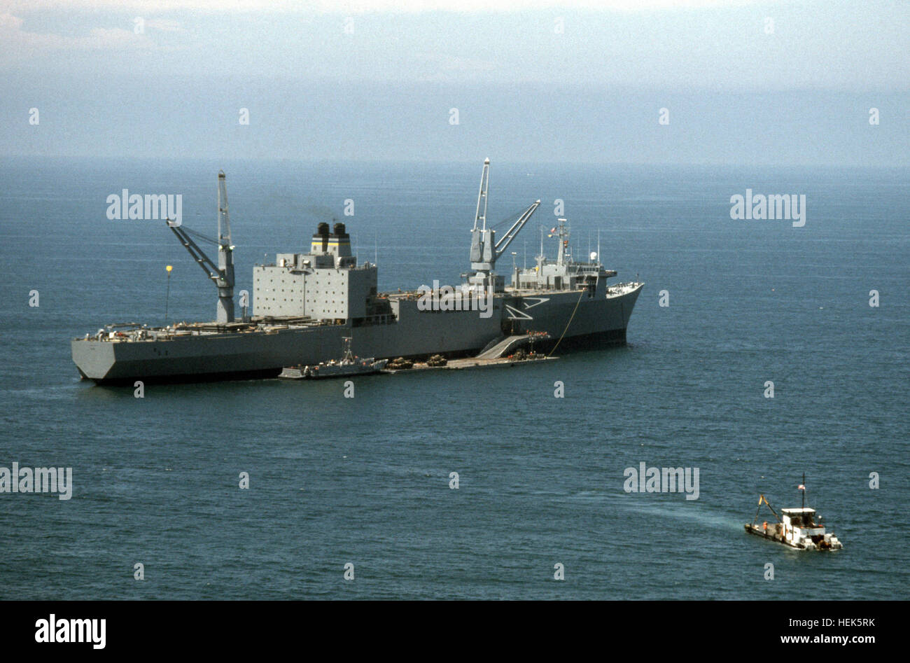 The vehicle cargo ship USNS Altair loads ground support equipment onto ...
