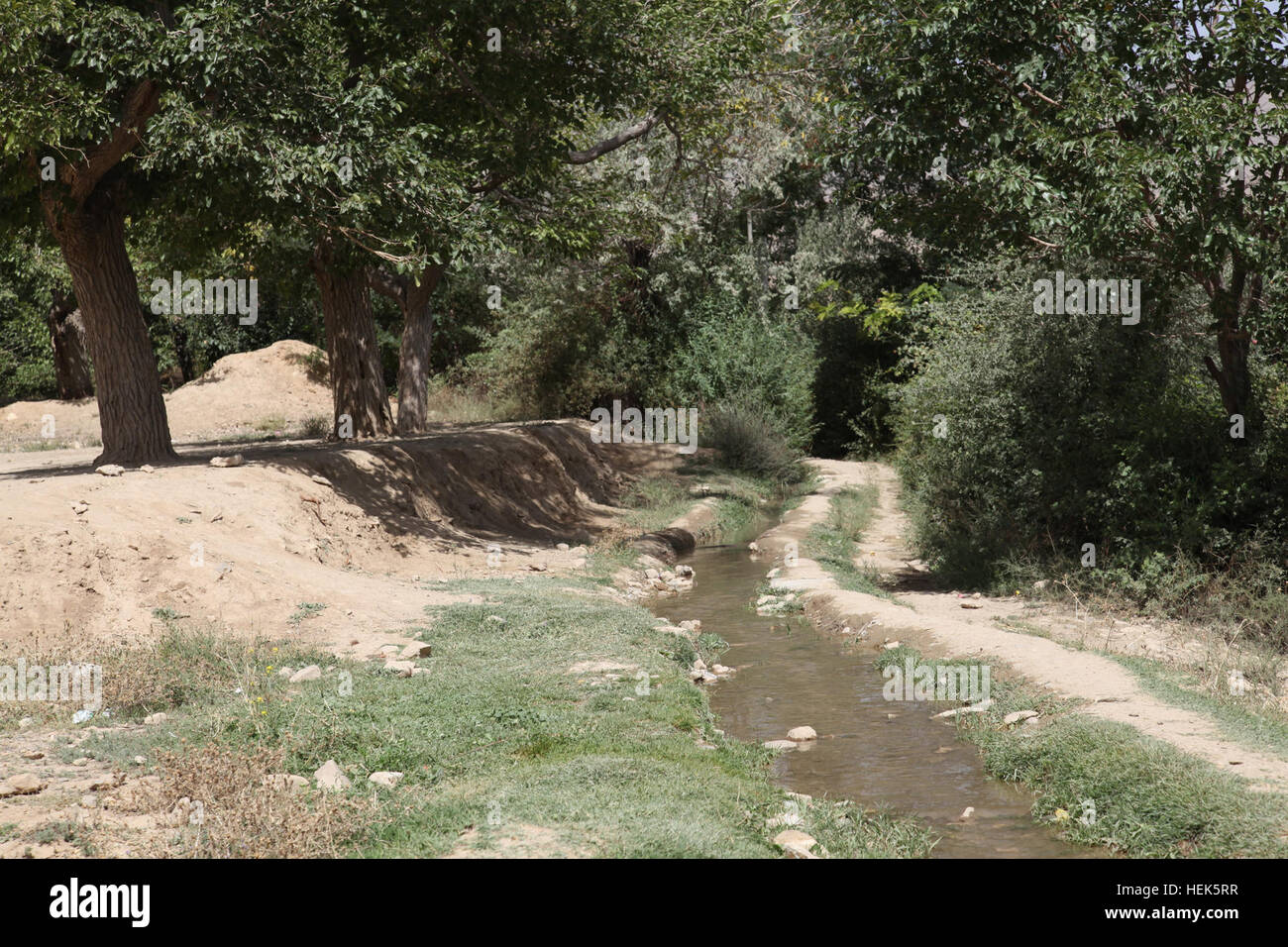 A stream is seen running down into a village out side of Combat ...