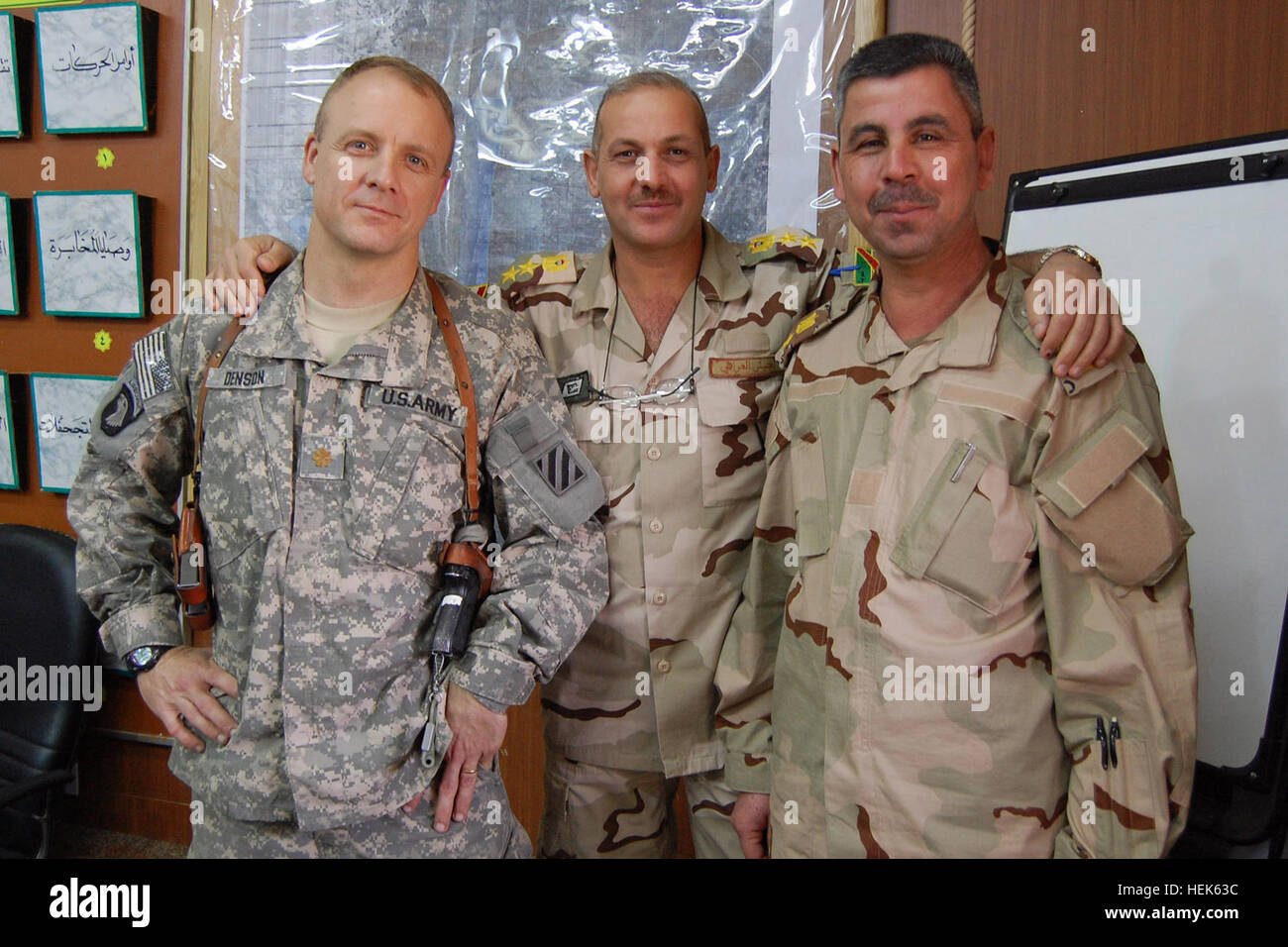Maj. Paul Denson (from left), a 9th Iraqi Army Division stability ...