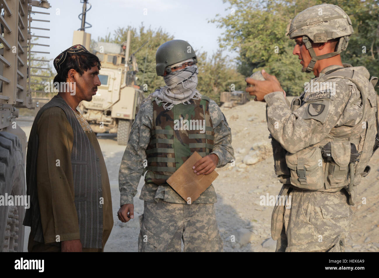 U.S. Army Sgt. William Hiniker, right, of 1st Platoon, 584th Mobility ...