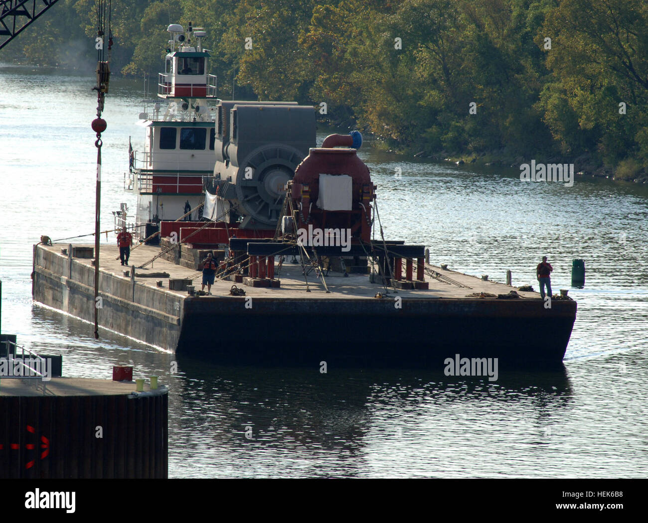 A barge carrying a 750,000-pound generator and 500,000-pound turbine ...